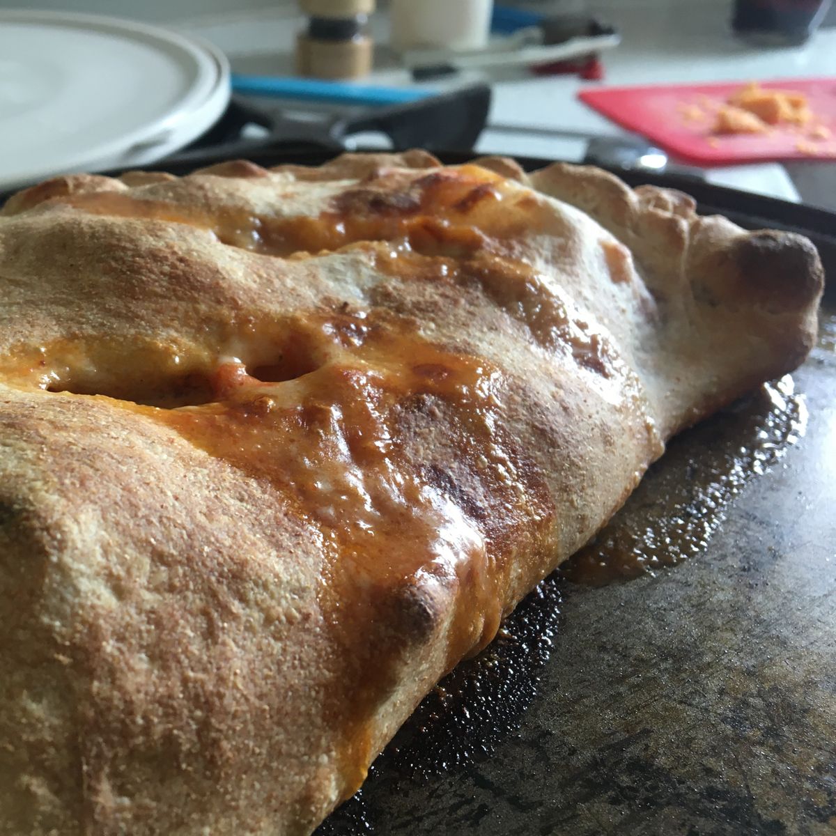 Spinach-Zucchini Calzone with Hot Tomato Sauce | Recipe | Kitchen Stories