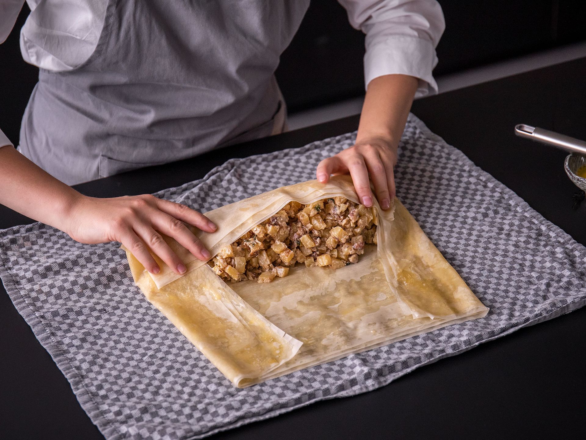 Savory potato and hazelnut strudel with braised cabbage and red wine ...