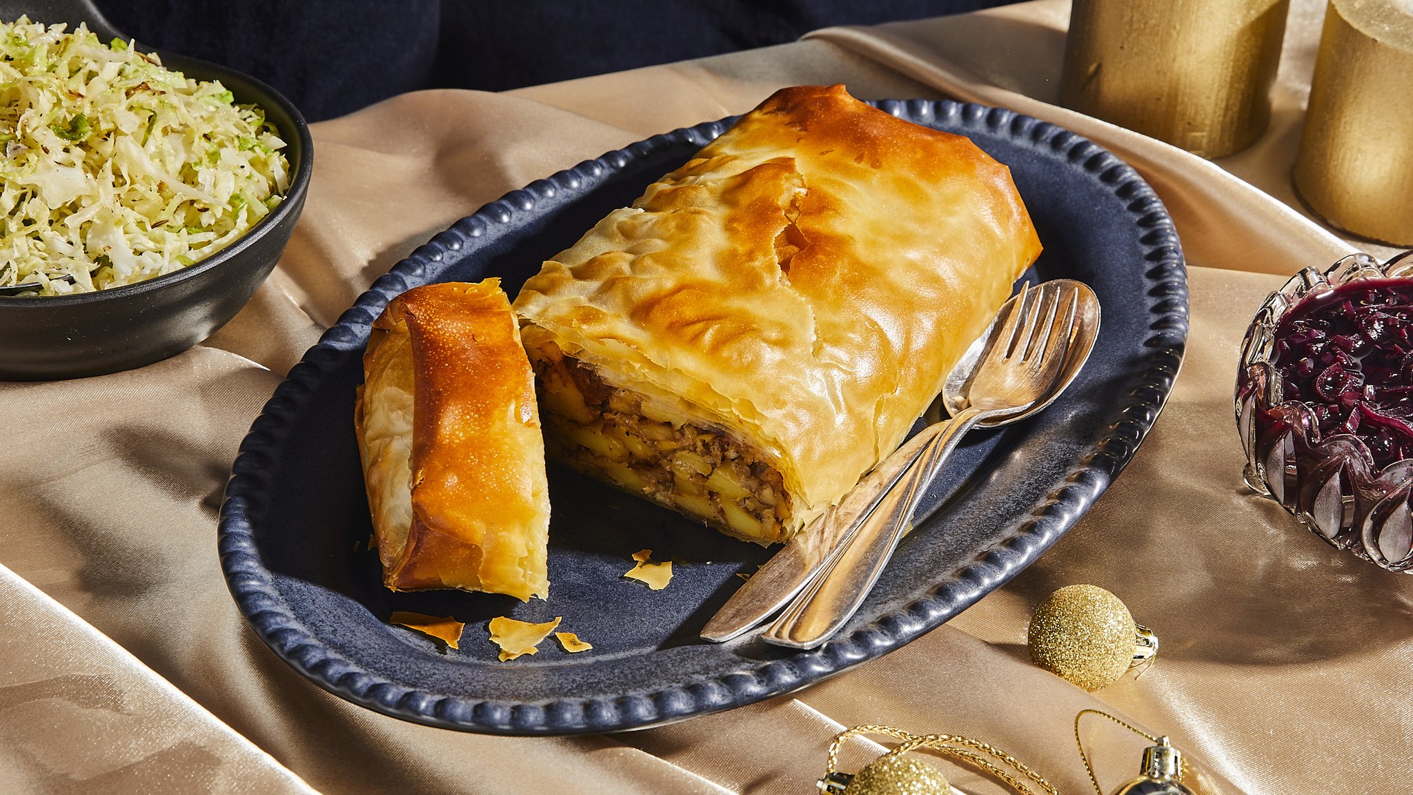 Savory potato and hazelnut strudel with braised cabbage and red wine ...